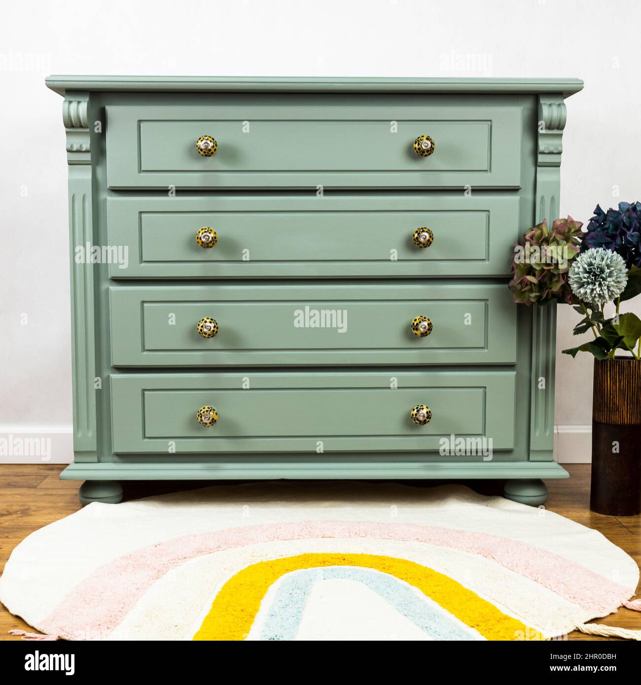Green chest of drawers after renovation painted in color Stock Photo ...