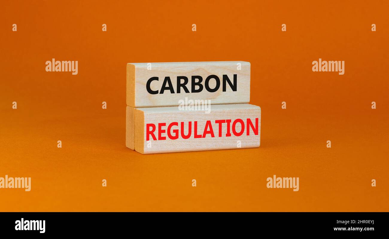 Carbon regulation symbol. Concept words Carbon regulation on wooden ...