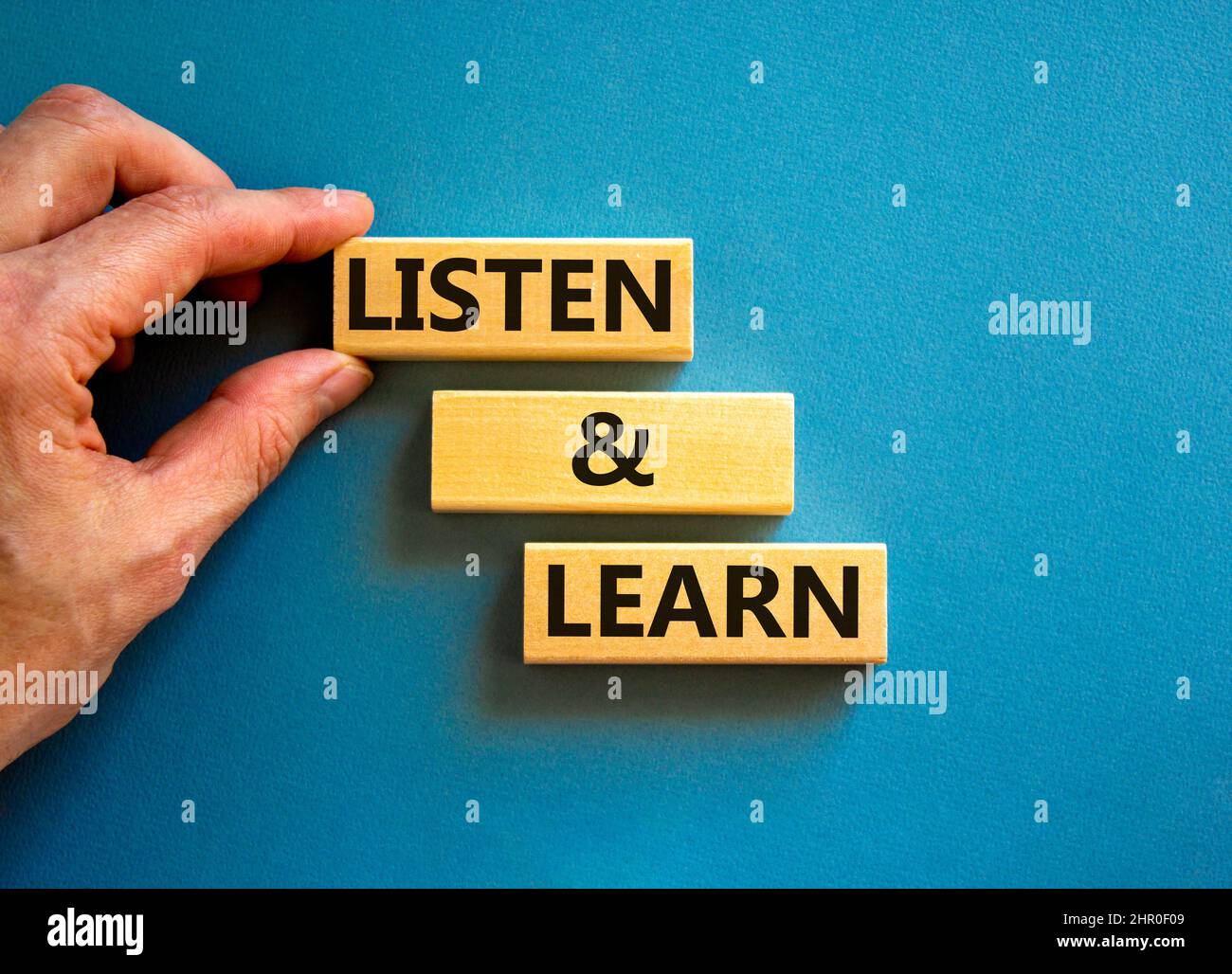 Listen and learn symbol. Concept words Listen and learn on wooden ...