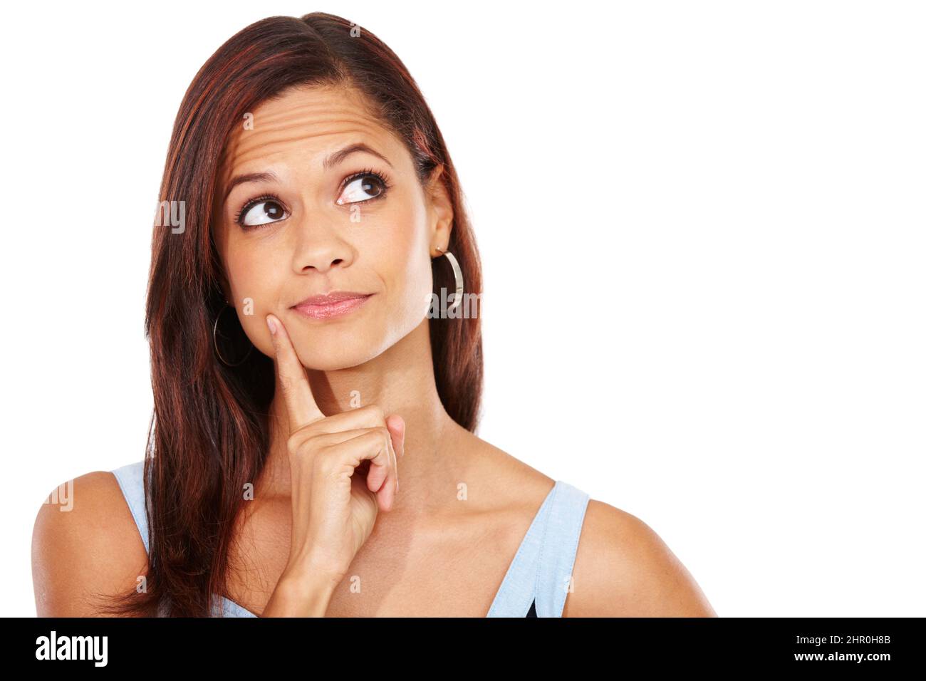 Shes simply gorgeous. Studio shot of an attractive young woman isolated ...