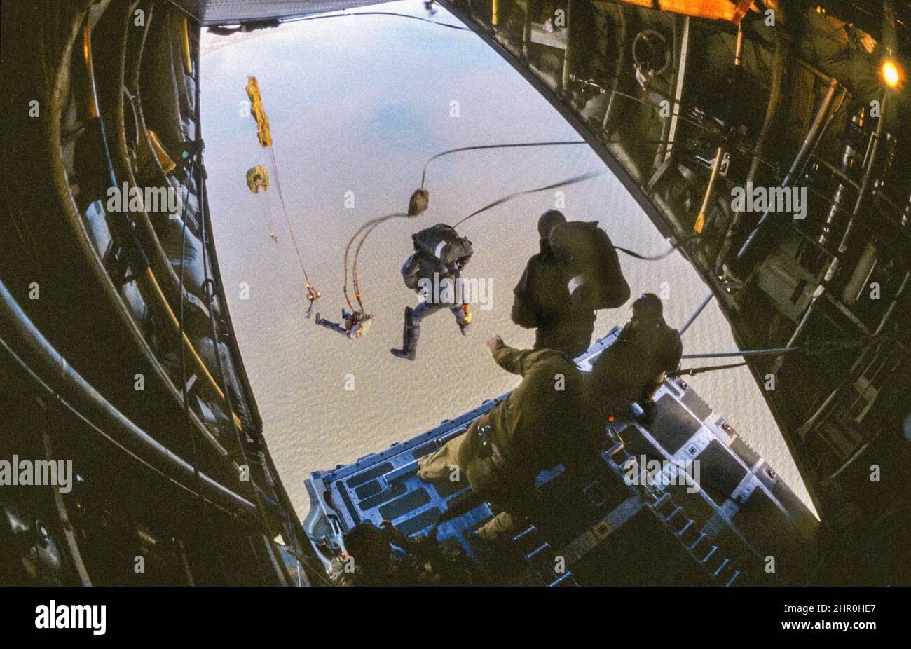 A view from inside a C-130 Hercules transport, looking rearwards as ...