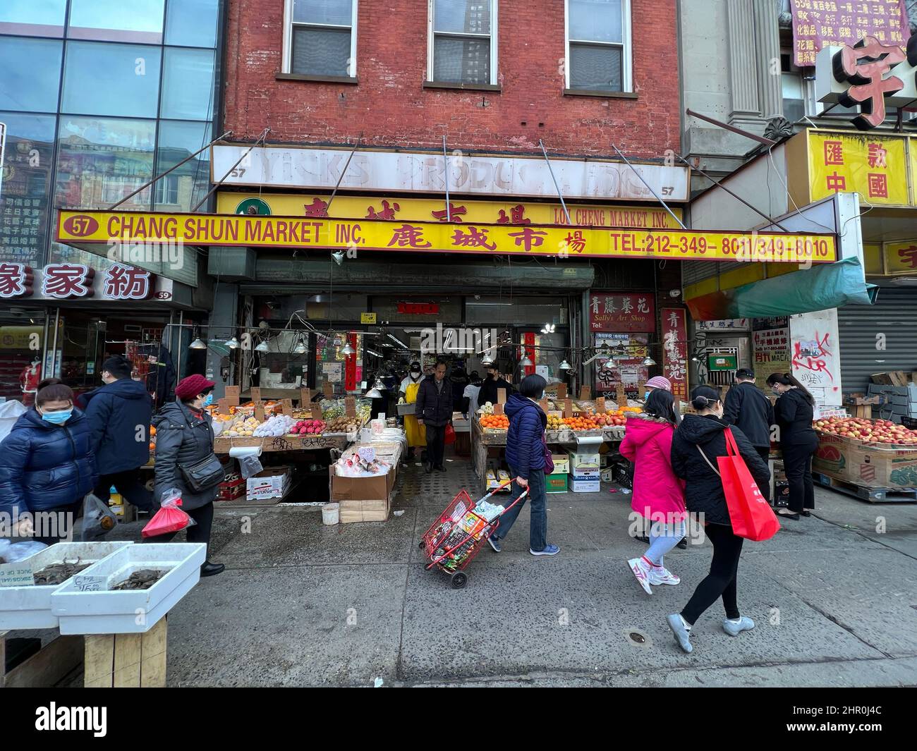 One of the numerous produce and fish markets along East Broadway in ...