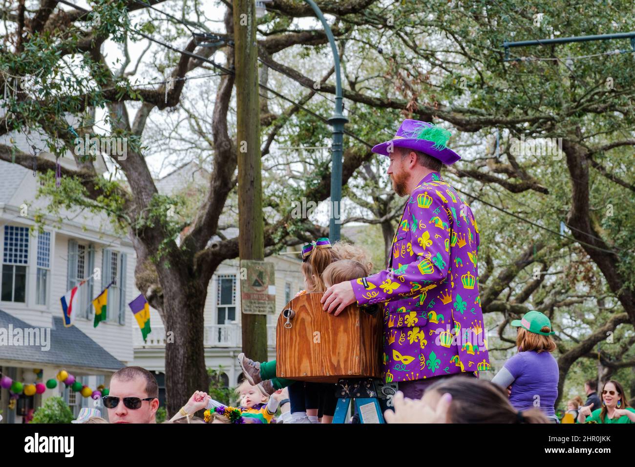 NEW ORLEANS, LA, USA - FEBRUARY 20, 2022: Colorfully dressed man on a ...