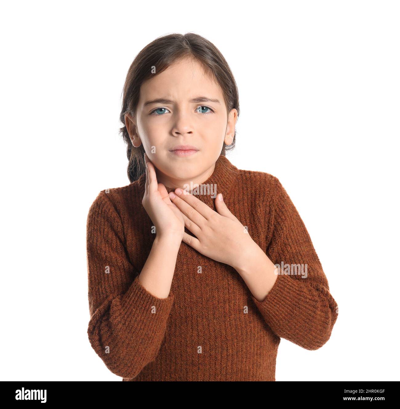Little girl suffering from sore throat on white background Stock Photo ...