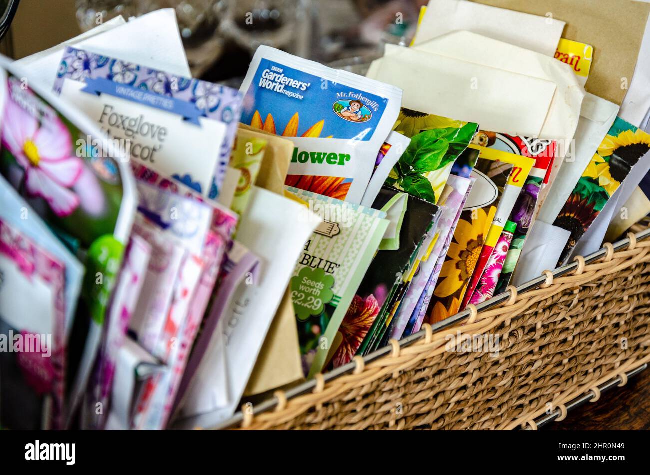 Packets of seeds kept tidily in a wicker basket Stock Photo - Alamy