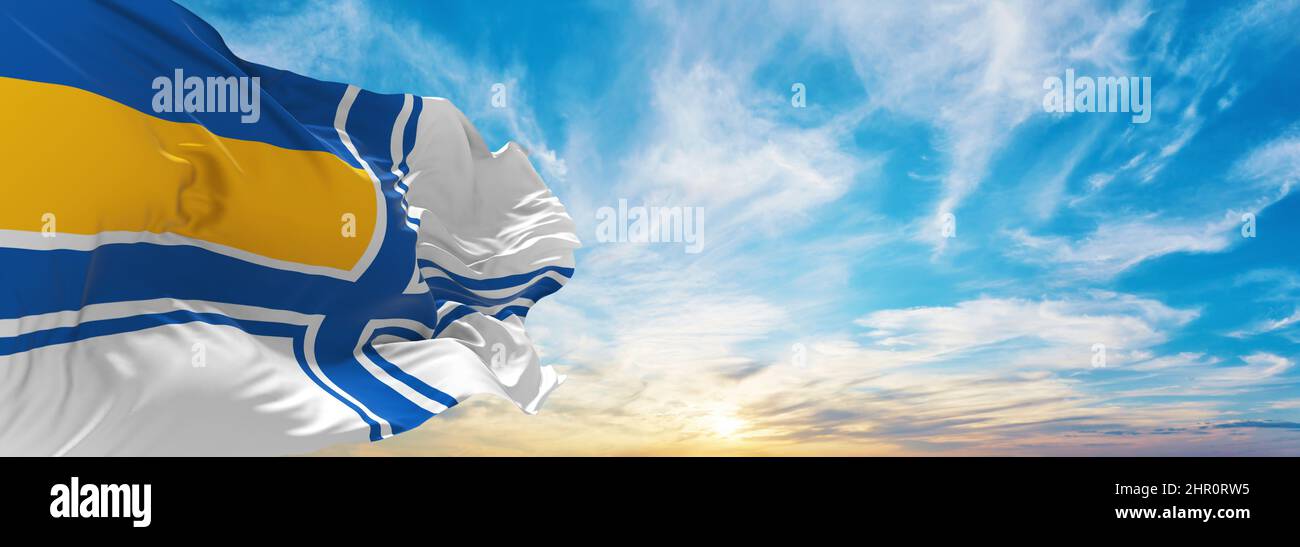flag of Naval Ensign , Ukraine at cloudy sky background on sunset ...