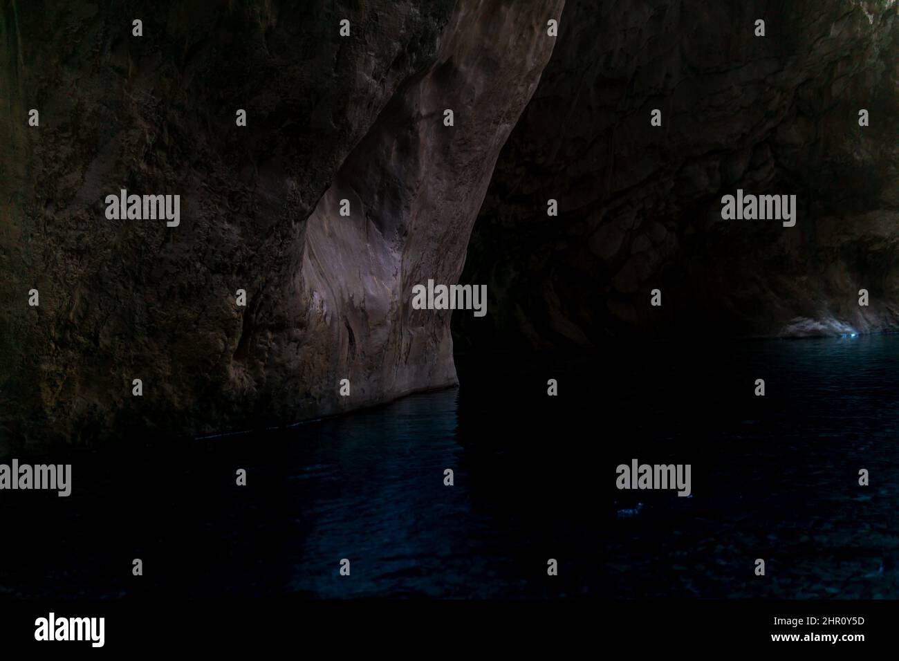 clean underground cave river in steep stone banks in the dark Stock ...