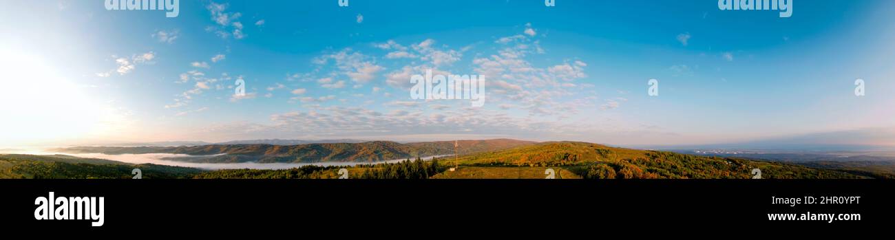 Beautiful autumn panorama of yellow and red trees against the ...