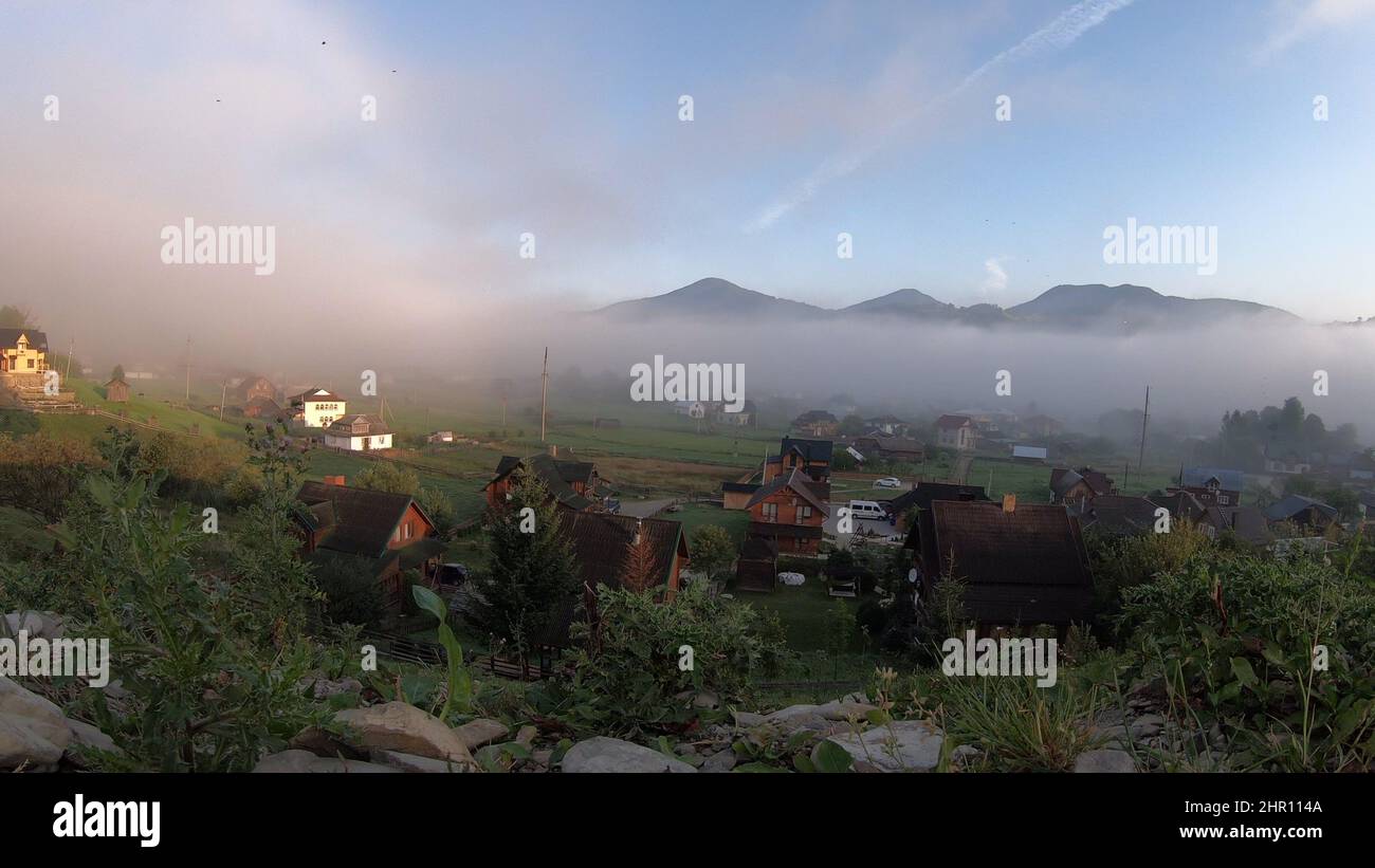 Morning fog dissipates in the mountains Carpathians. Morning fog Stock ...