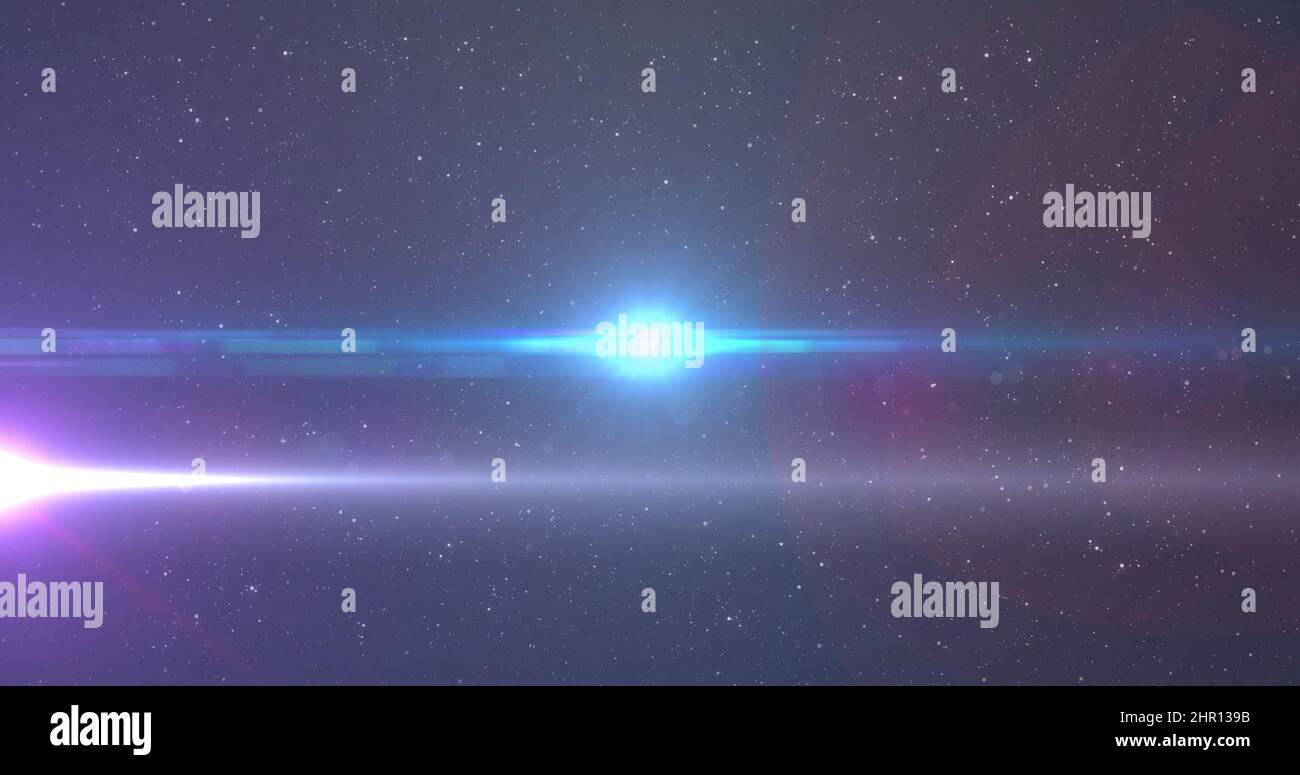 Image of glowing blue light moving over spots of light and stars in ...