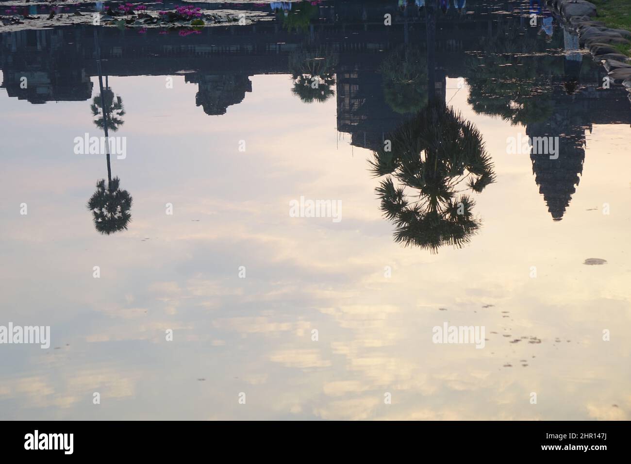 Amazing water reflection of the Angkor Wat ruins at sunrise, Siem Reap ...