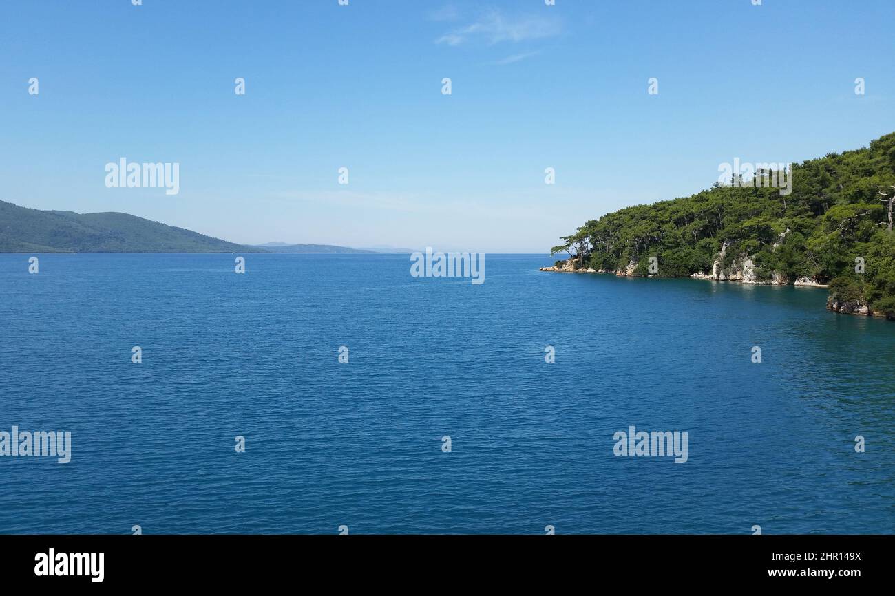 A part from heaven with blue sea, trees and blue sky Stock Photo - Alamy