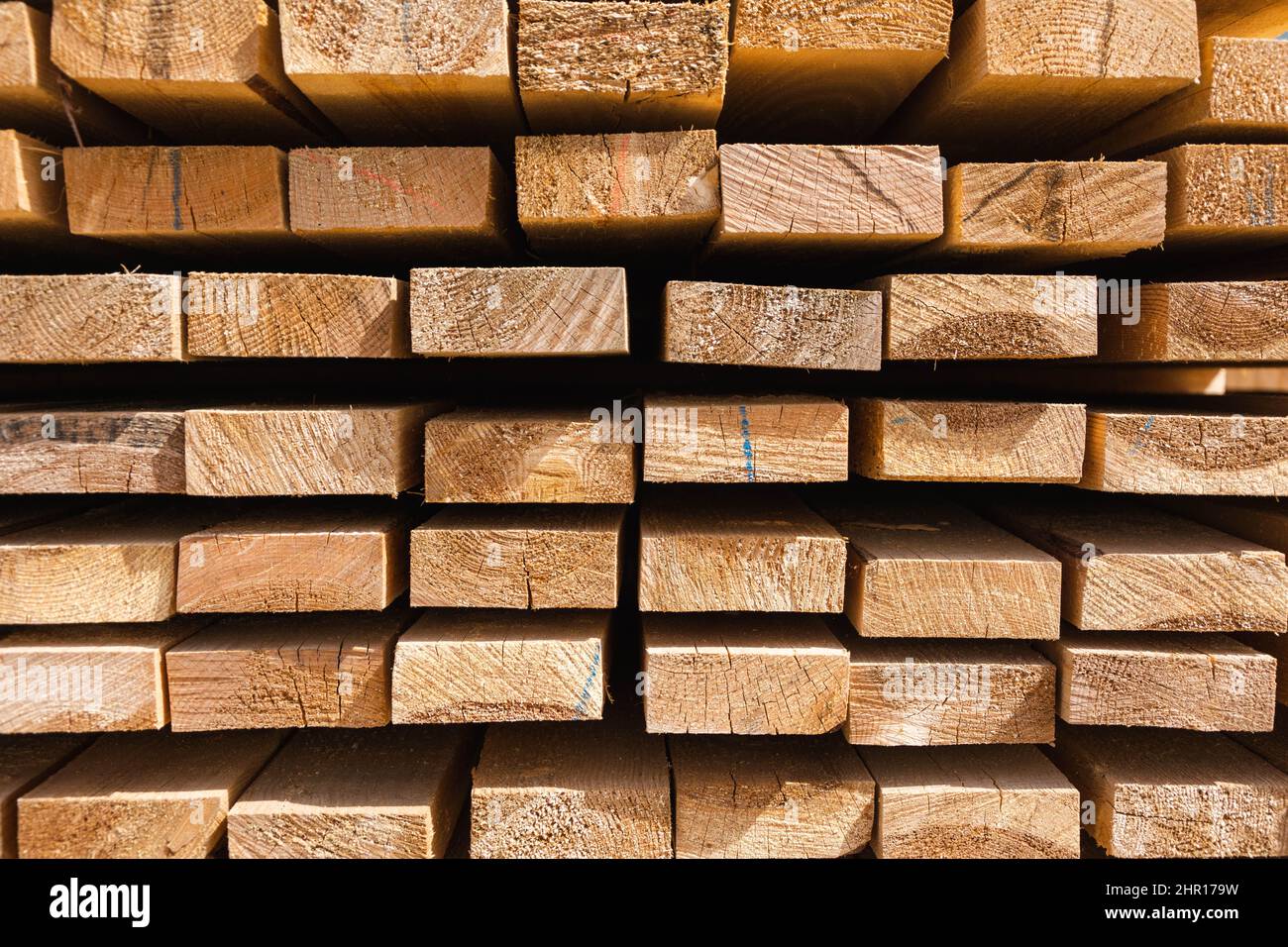 a stack of wooden boards, wooden boards at a sawmill, a warehouse of ...