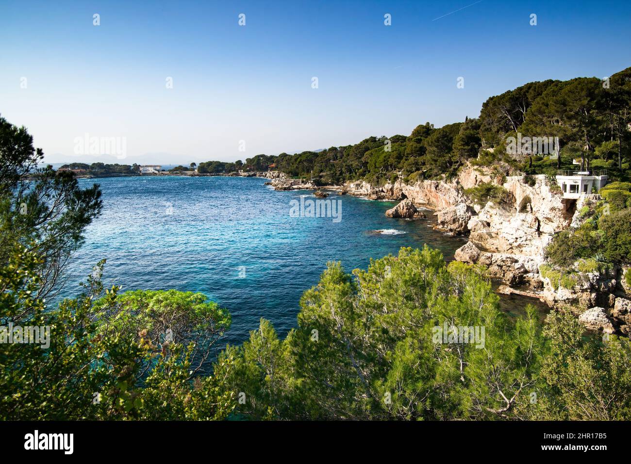 Blue mediterranean sea, and cliffs on the `Cap d'Antibes`, Antibes cape ...
