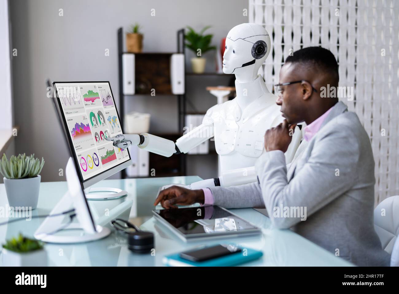 AI Humanoid Advisor Robot Looking At KPI Data Dashboard Stock Photo - Alamy