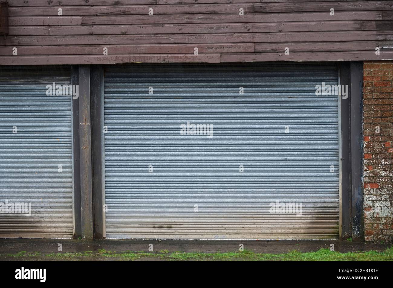Garage roller shutter closed due to business closure Stock Photo - Alamy
