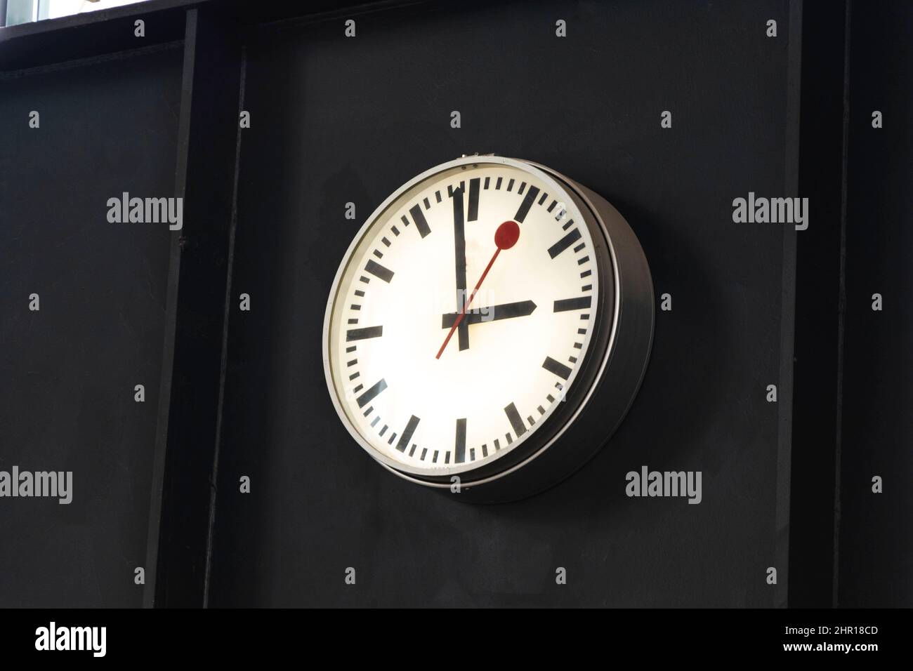 A large clock with hands at the train station in the waiting room Stock ...