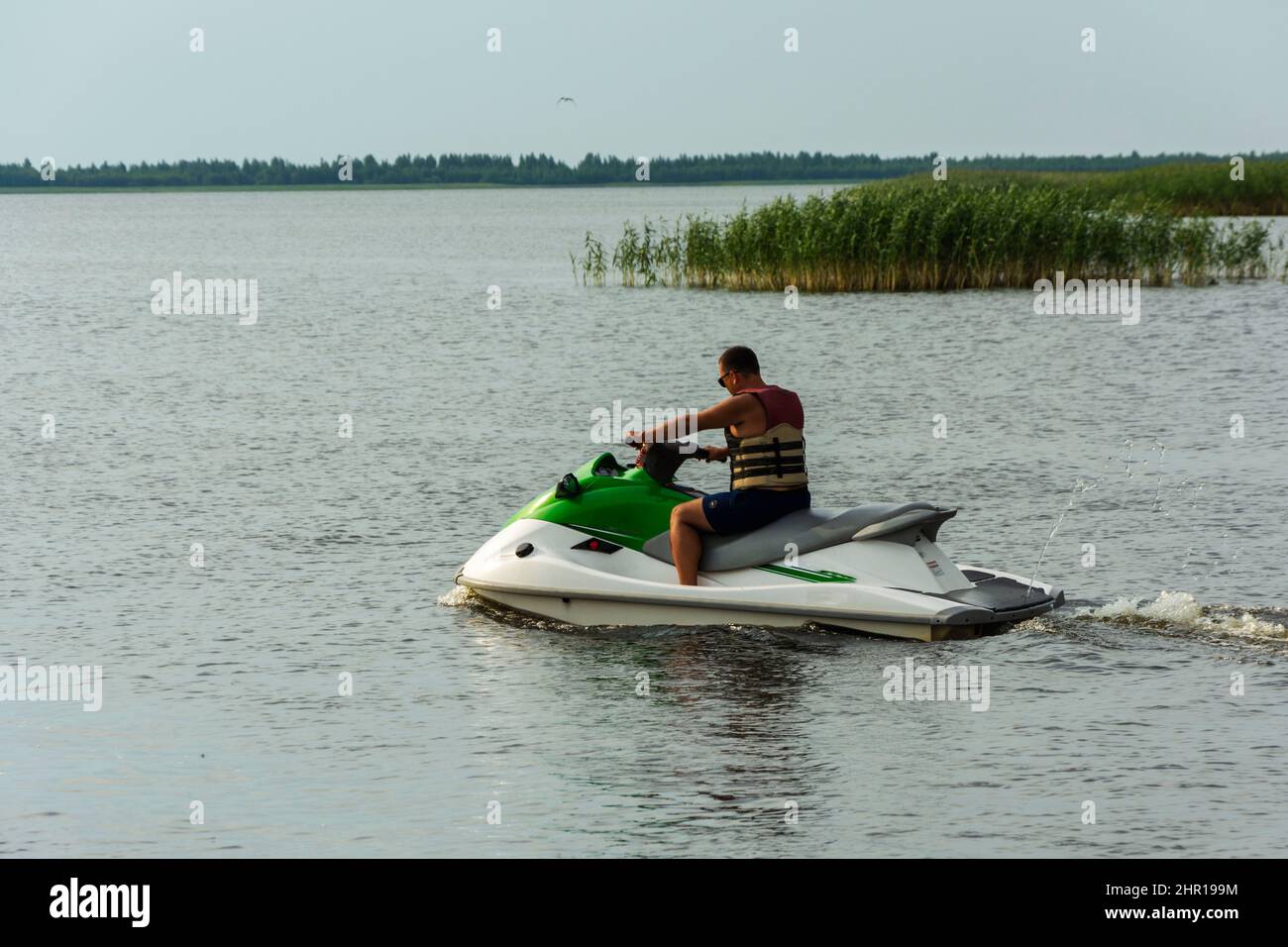 Young guy rides jet ski hi-res stock photography and images - Alamy