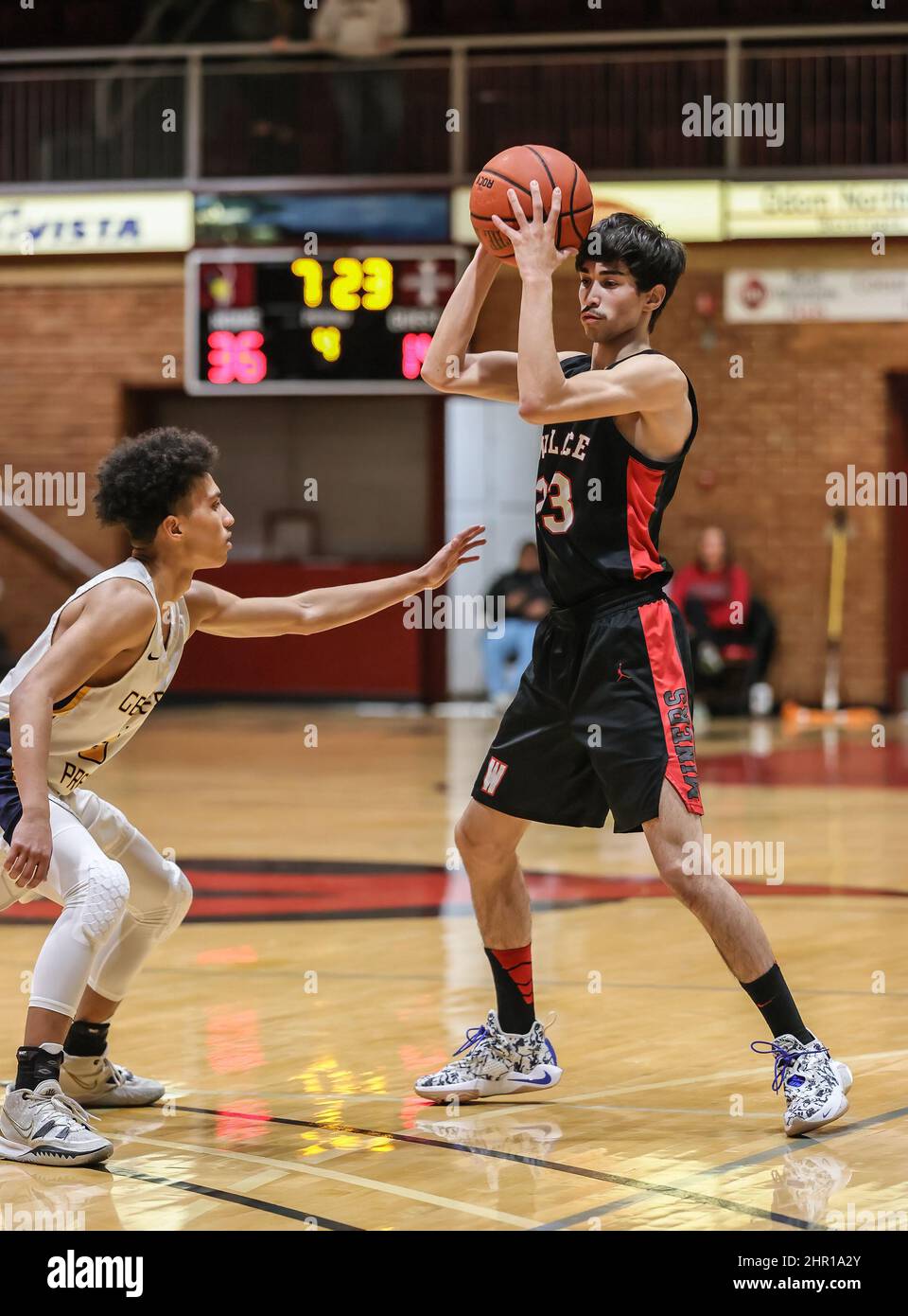 Basketball action with Wallace vs Genesis Prep High School in Coeur d ...