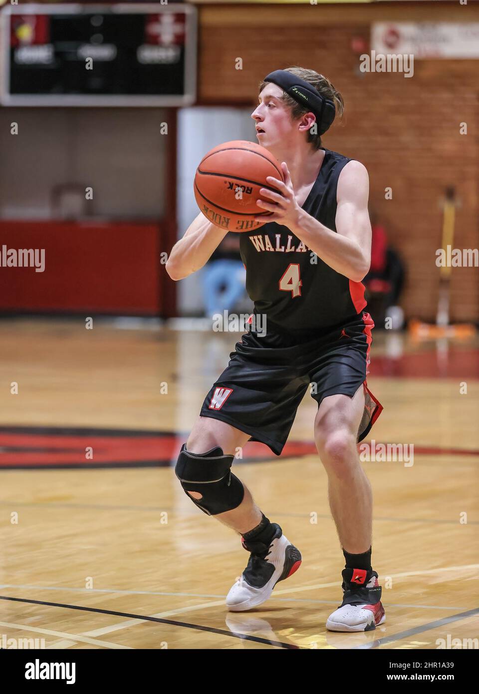 Basketball action with Wallace vs Genesis Prep High School in Coeur d ...