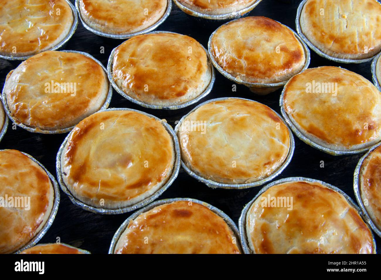 Empada Brazilian snack. pie with chicken Stock Photo - Alamy