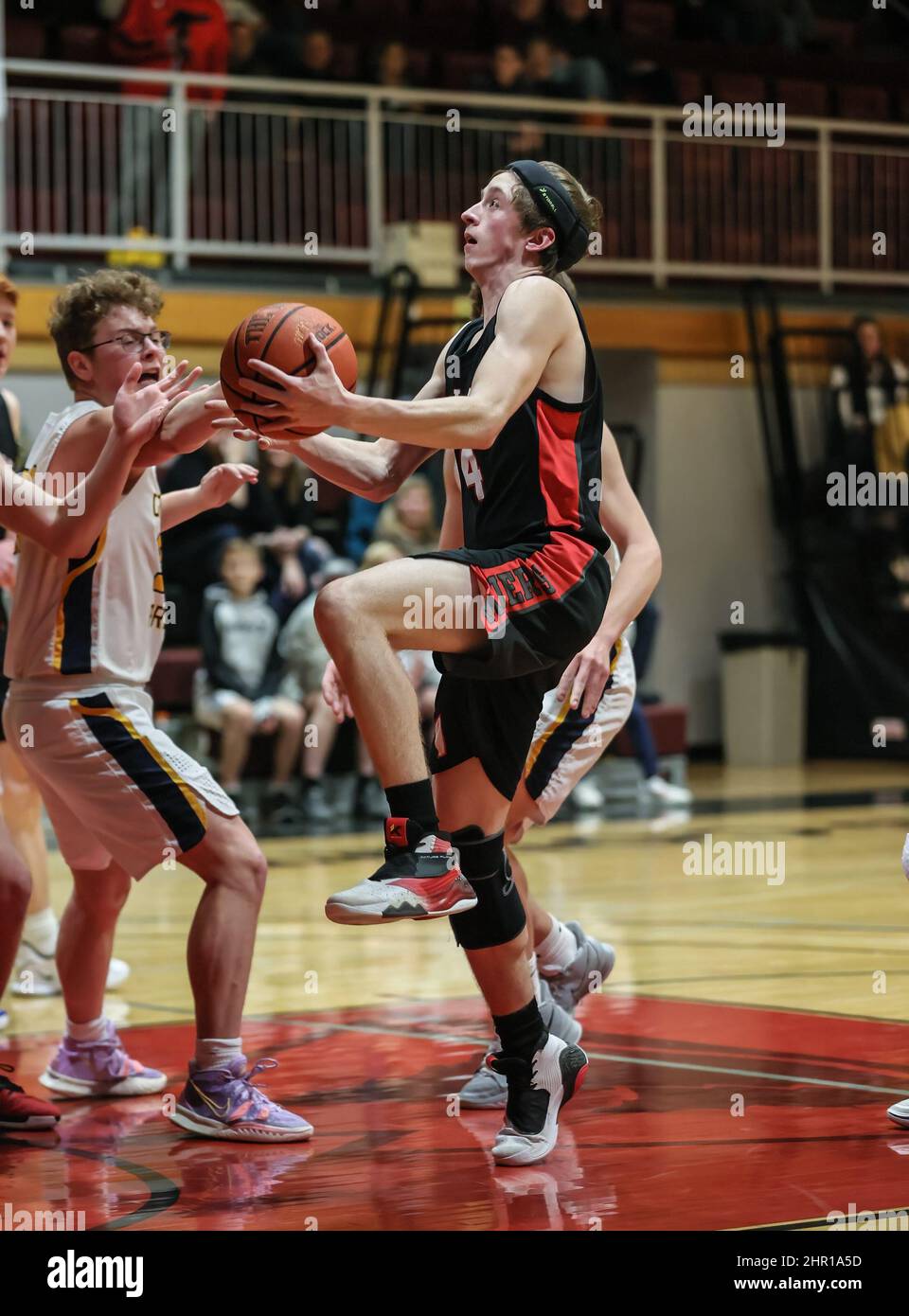 Basketball action with Wallace vs Genesis Prep High School in Coeur d ...