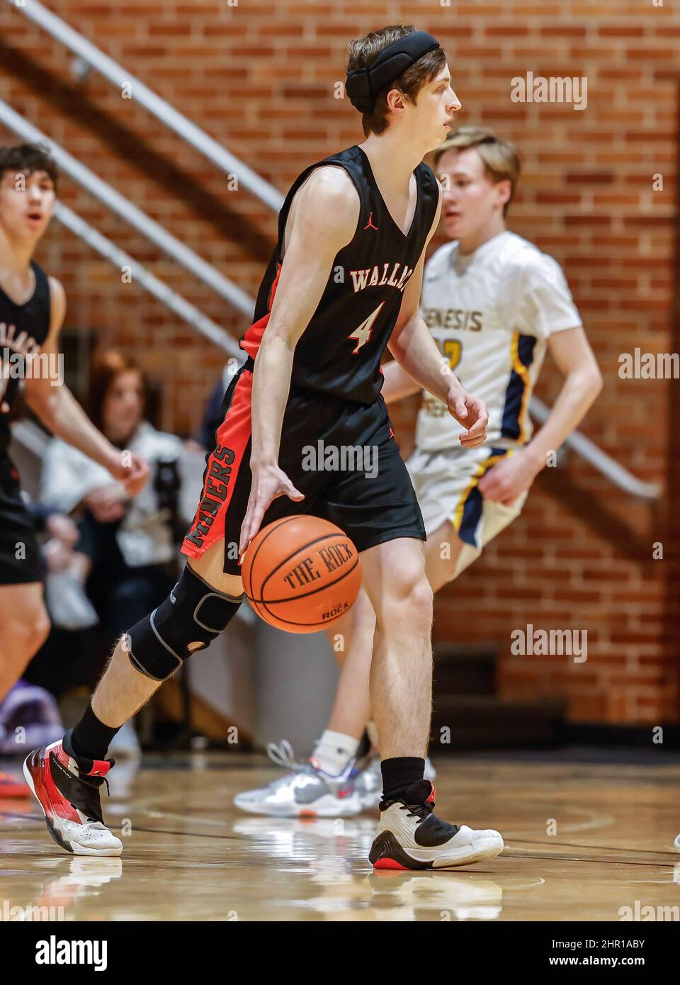 Basketball action with Wallace vs Genesis Prep High School in Coeur d ...