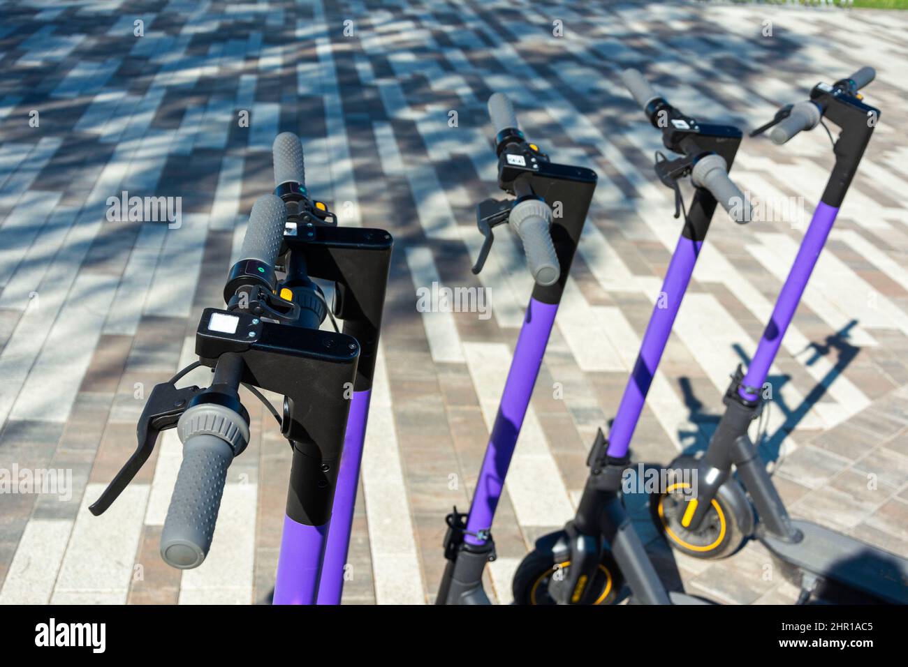 Electric scooter rental in the parking lot, active recreation, city ...