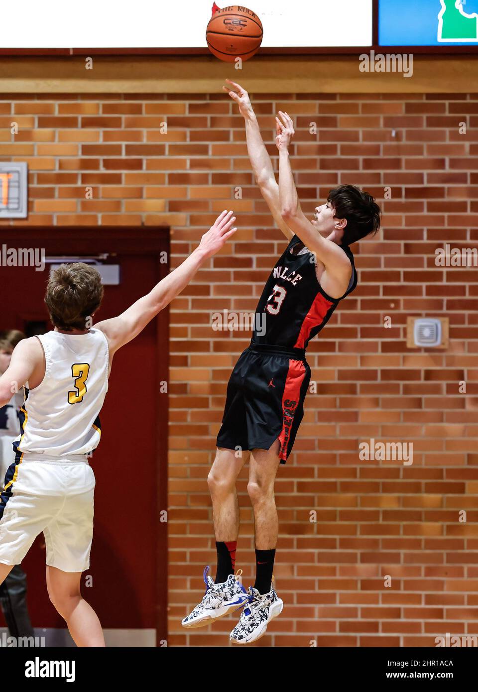 Basketball action with Wallace vs Genesis Prep High School in Coeur d ...