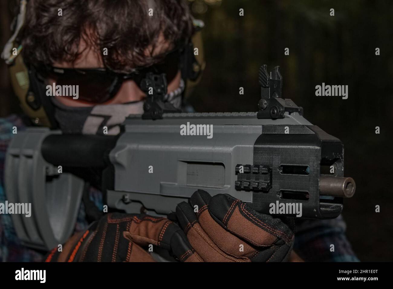 An anonymous man fires a 3D printed FGC-9 (F*ck Gun Control 9mm) near ...