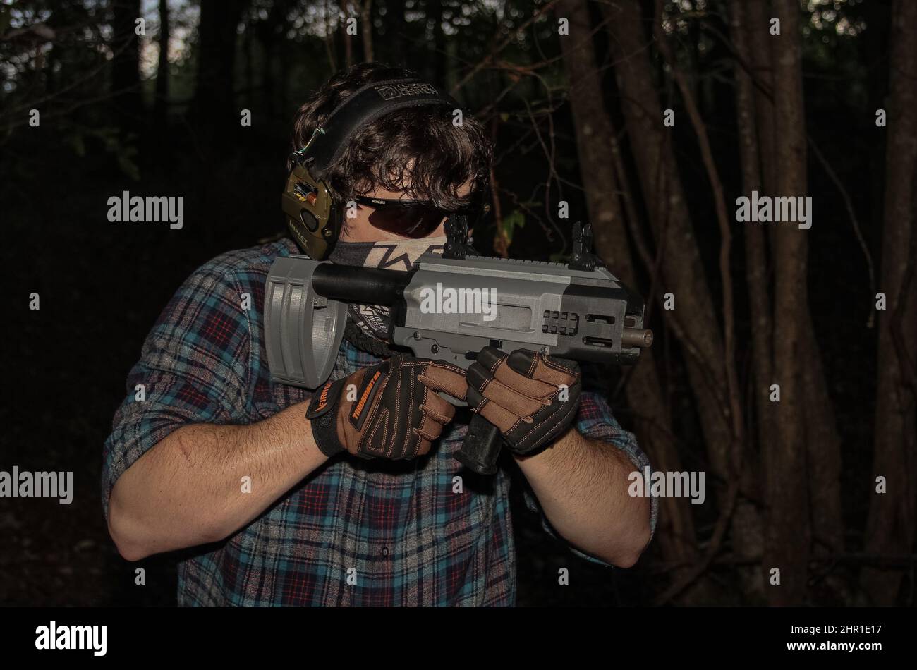 An anonymous man fires a 3D printed FGC-9 (F*ck Gun Control 9mm) near ...