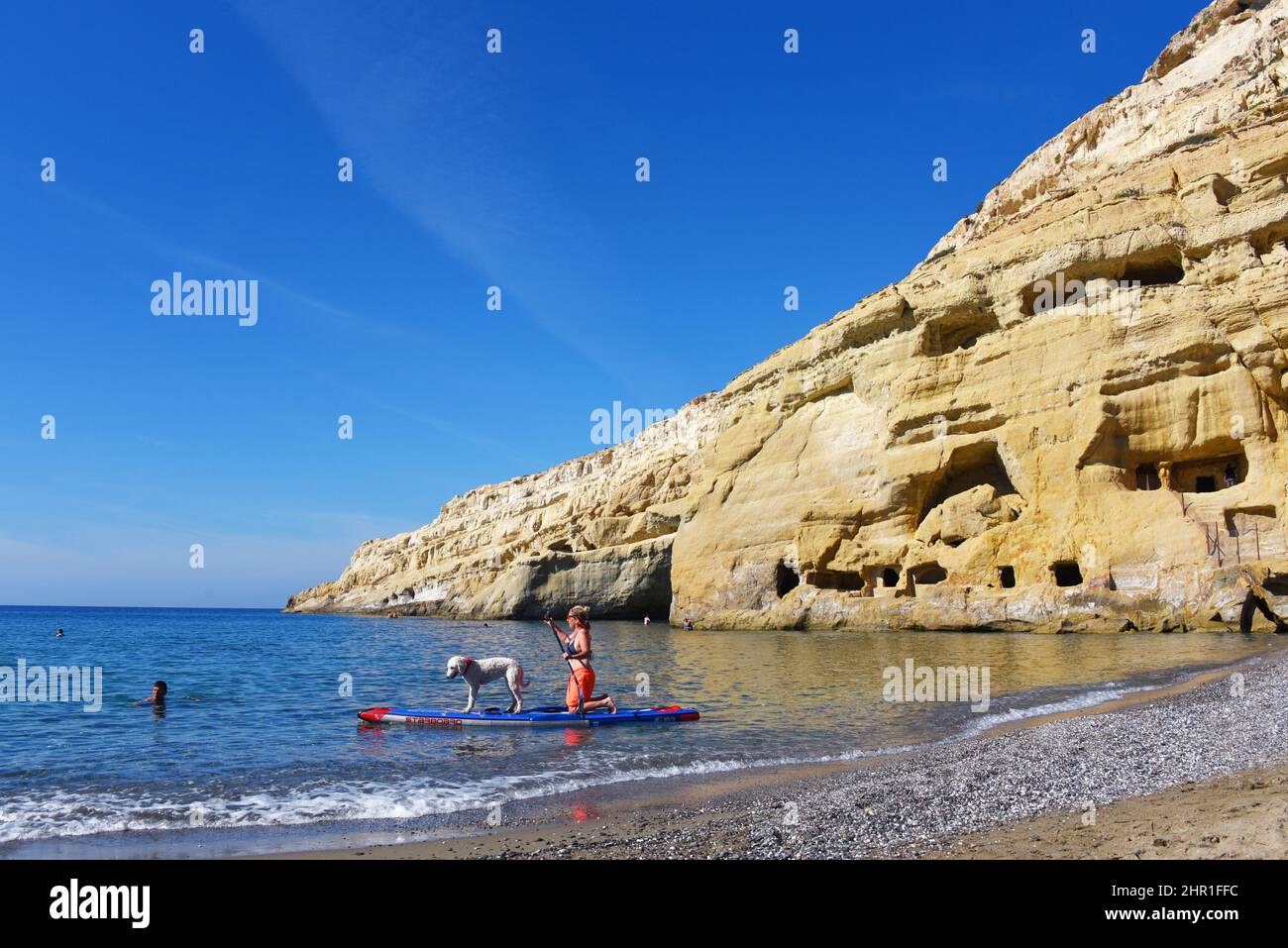 Matala Beach with the hippie caves, Greece, Crete, Matala Stock Photo ...