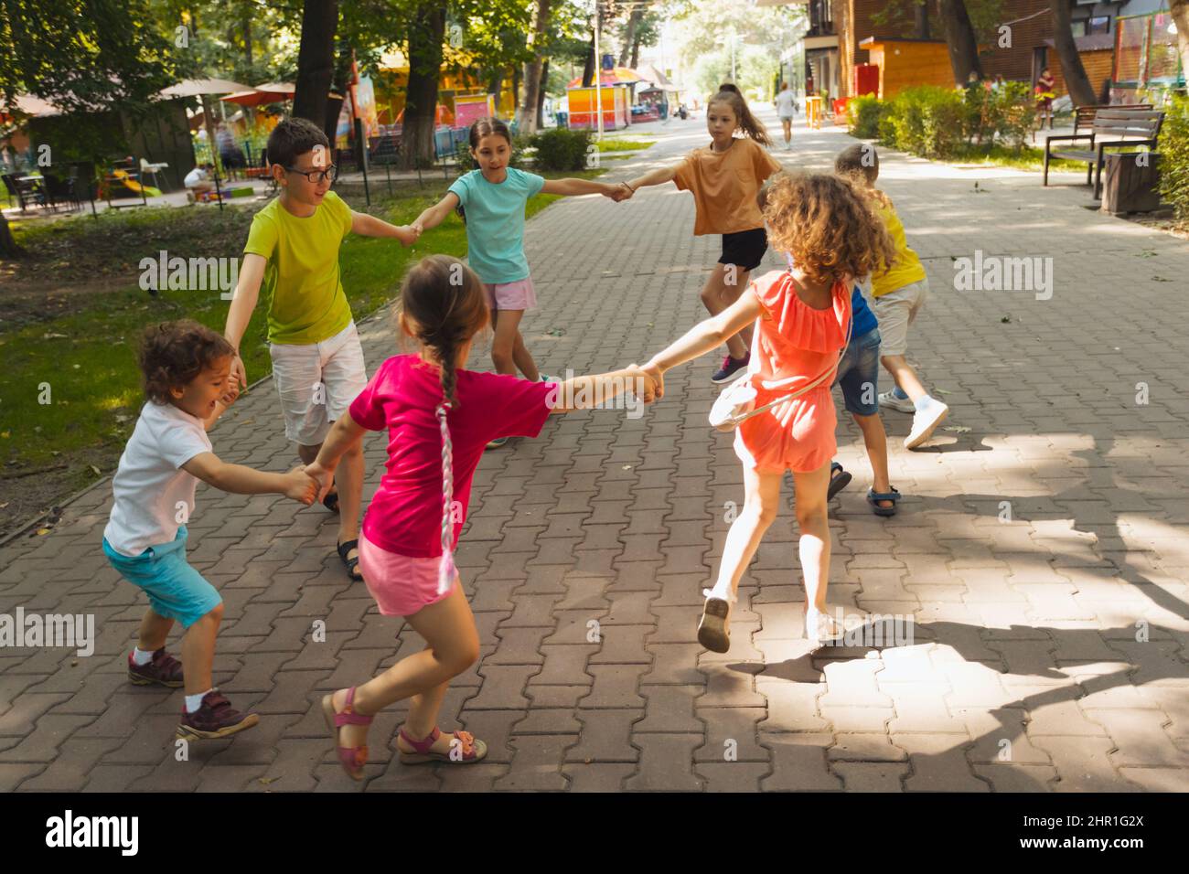 The happy children are having fun in the park Stock Photo - Alamy