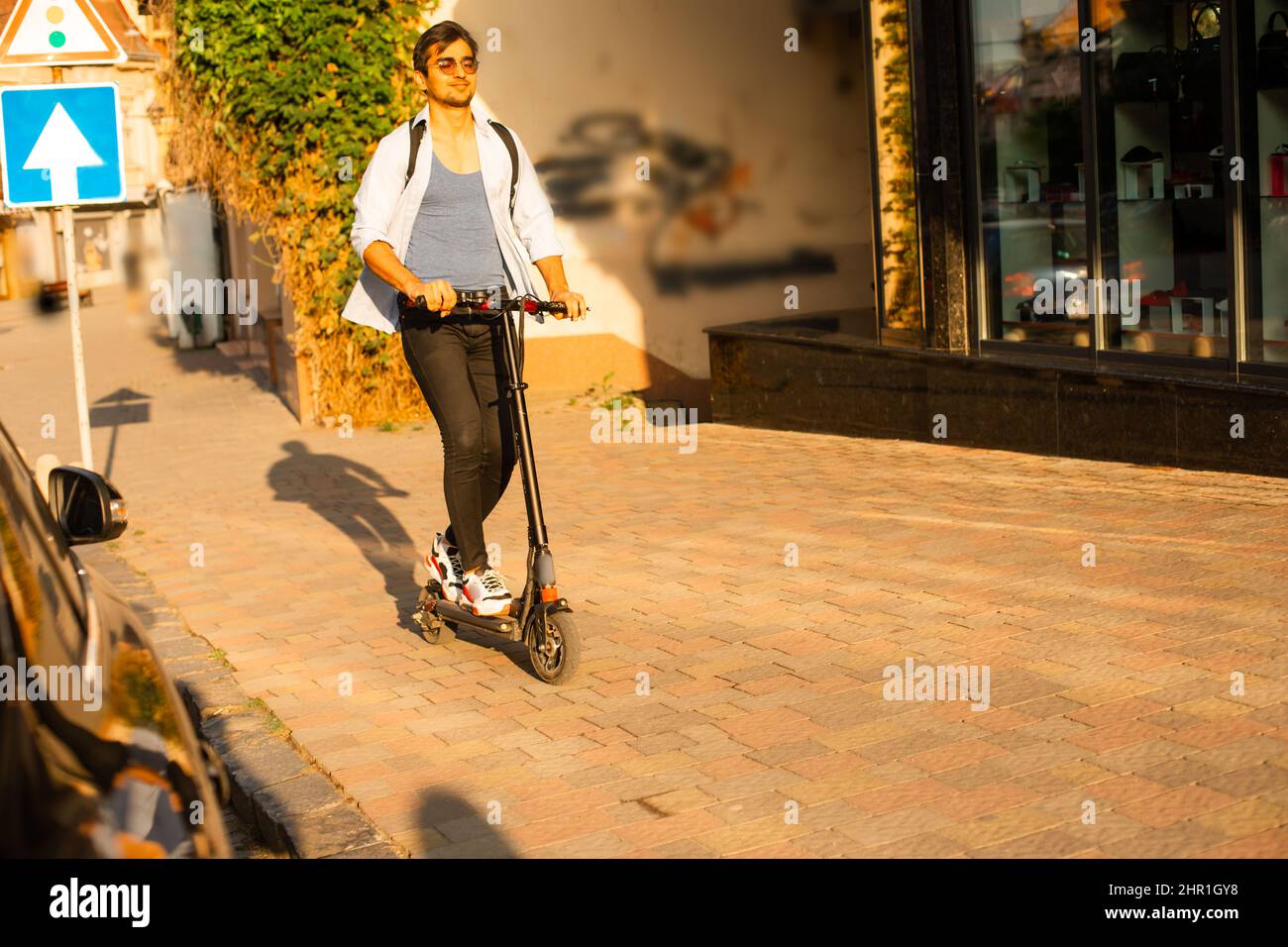The high school student goes to study on a scooter Stock Photo - Alamy