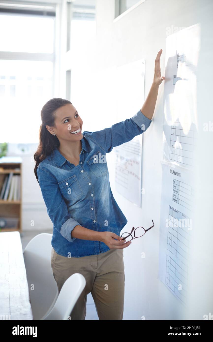 Her presentation is going perfectly. Cropped shot of an attractive ...