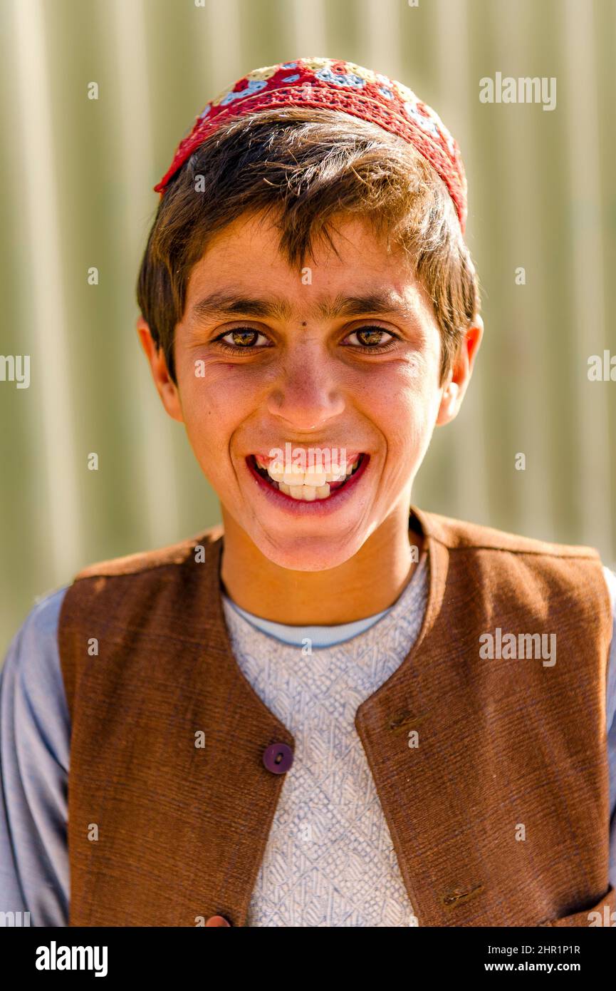 A young boy at an Afghan market in Tarin Kot, Afghanistan Stock Photo ...