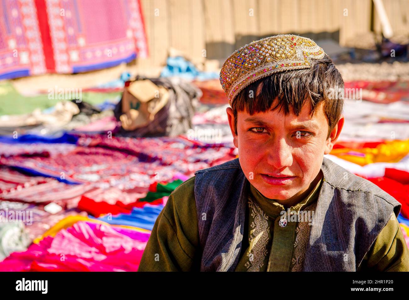 A young boy at an Afghan market in Tarin Kot, Afghanistan Stock Photo ...