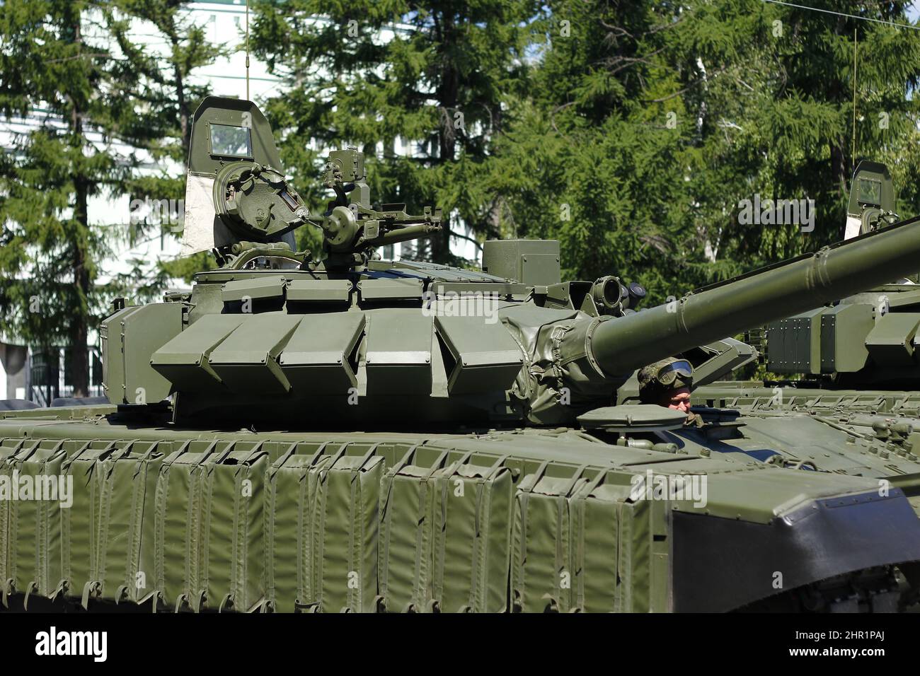 Military tanks on the central square of city. The concept of fighting ...