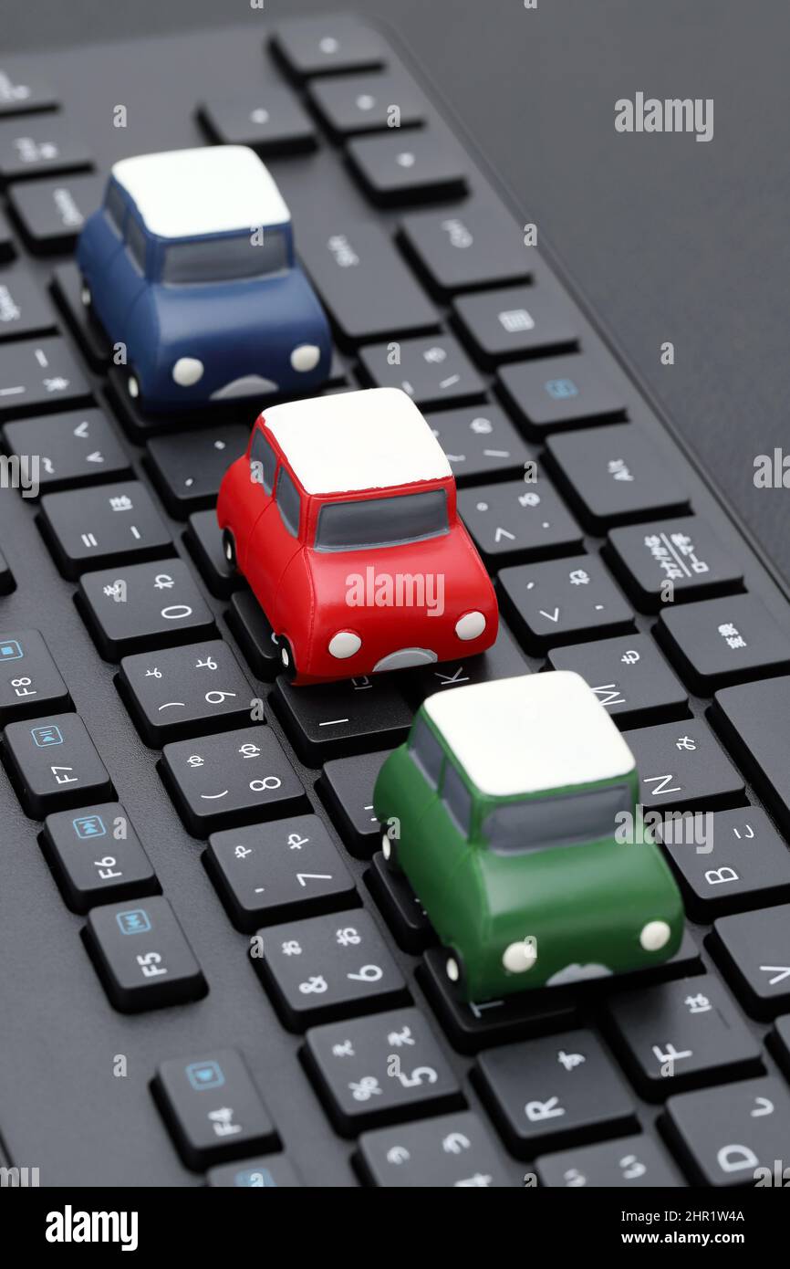 Small toy car on Alphabetics and Japanese hiragana typing keyboard ...