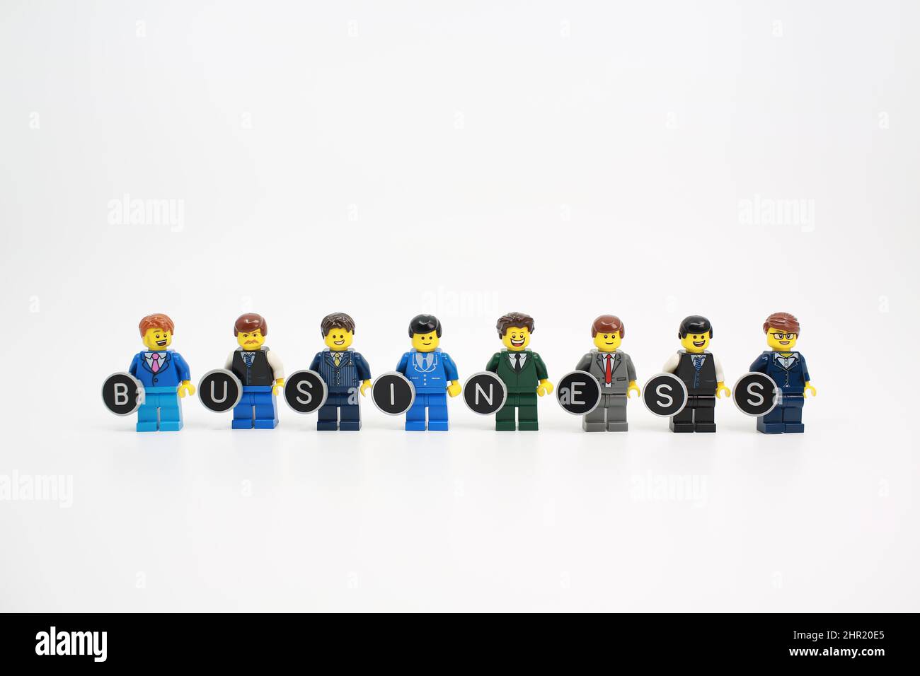 business man assemble to be a team Stock Photo - Alamy