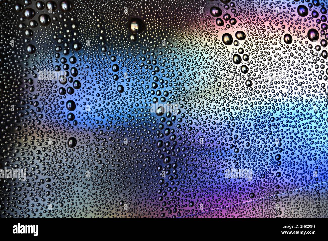 Rainbow Condensation on Water Bottle Stock Photo - Alamy