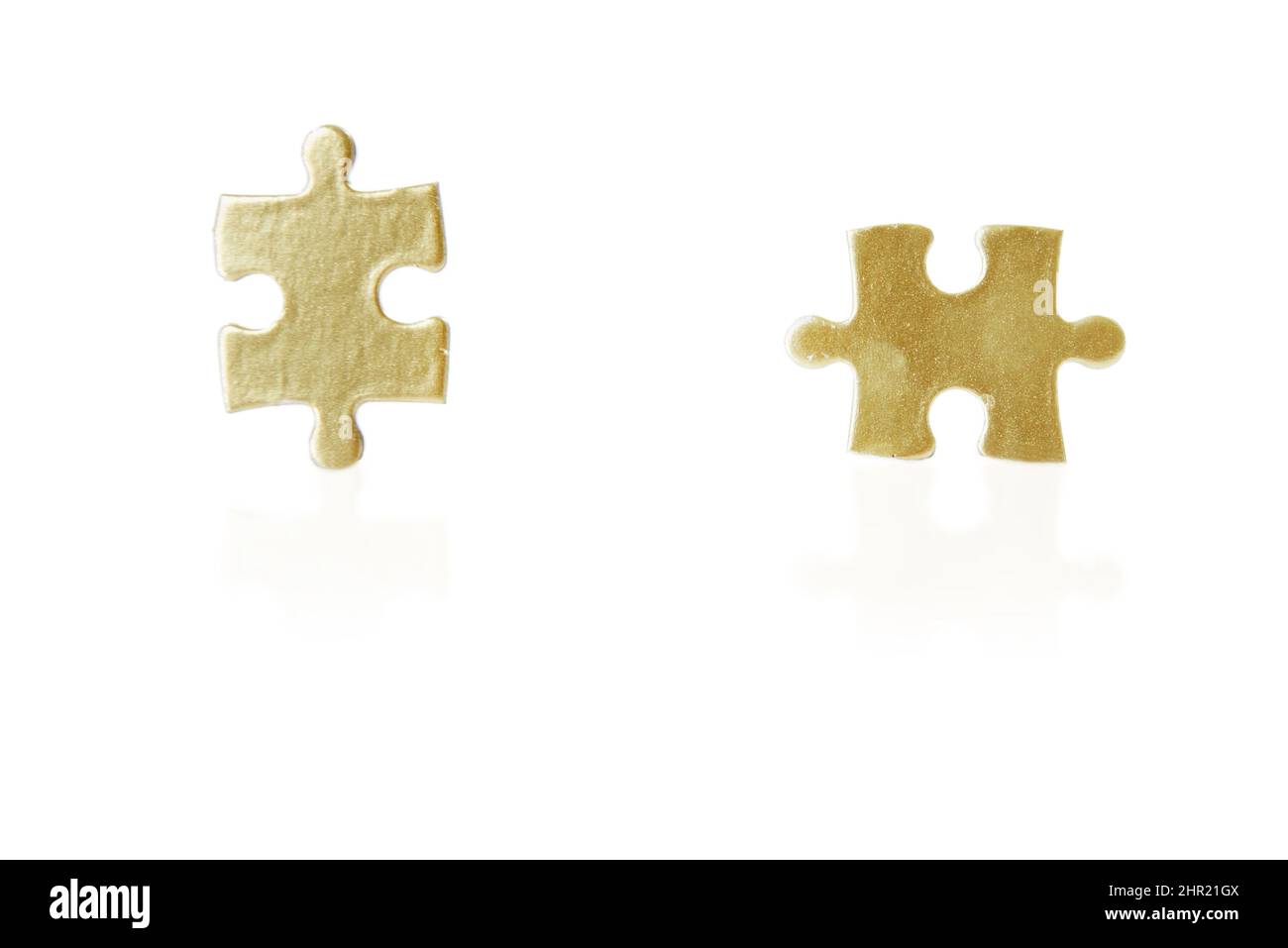 Two jigsaw puzzle pieces fit hi-res stock photography and images - Alamy