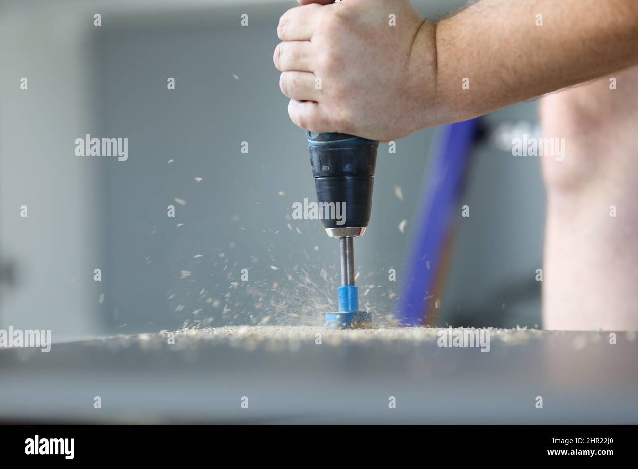 Professional worker using tool Stock Photo - Alamy