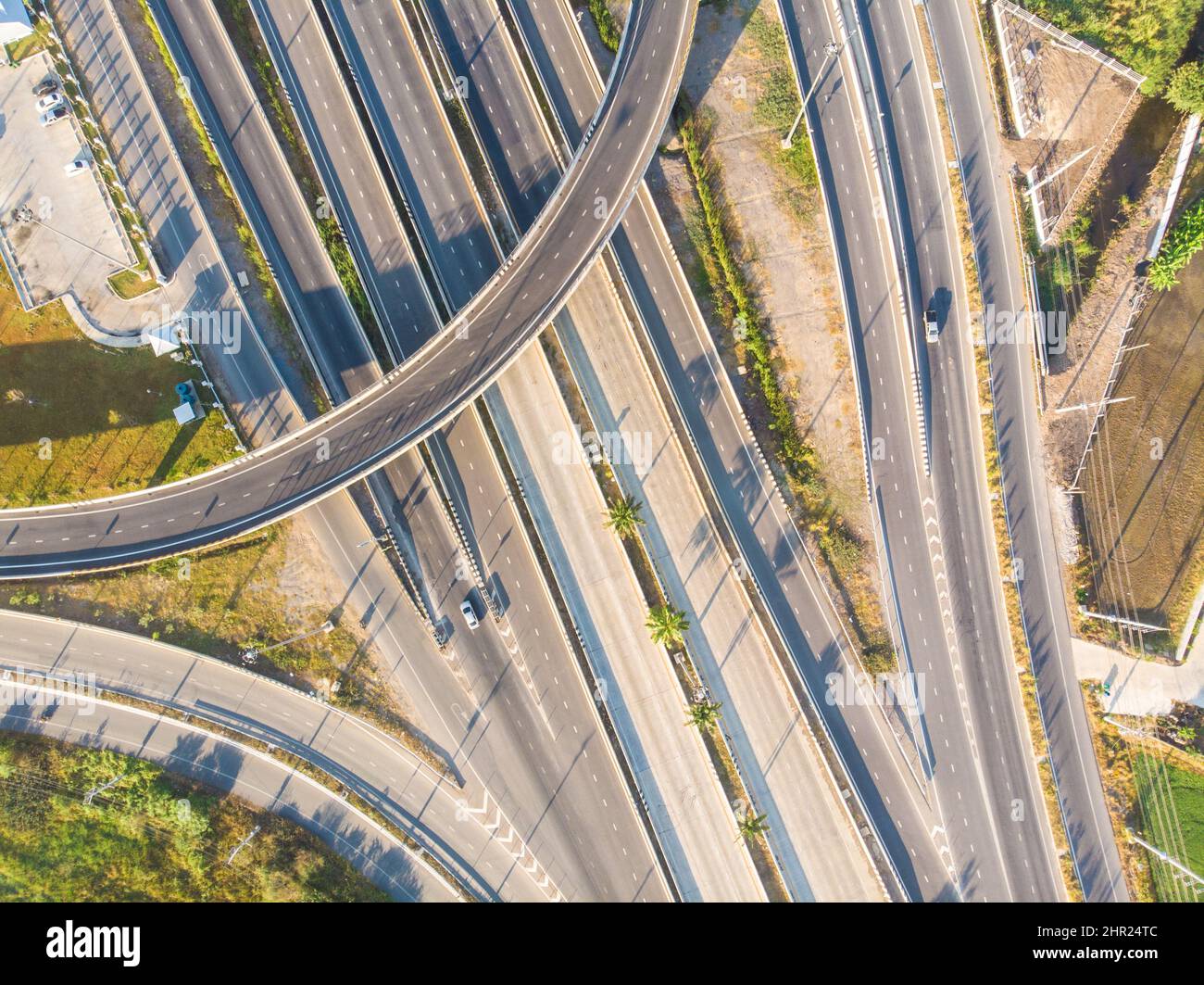 Transport junction freeway road with vehicle movement in morning rural ...