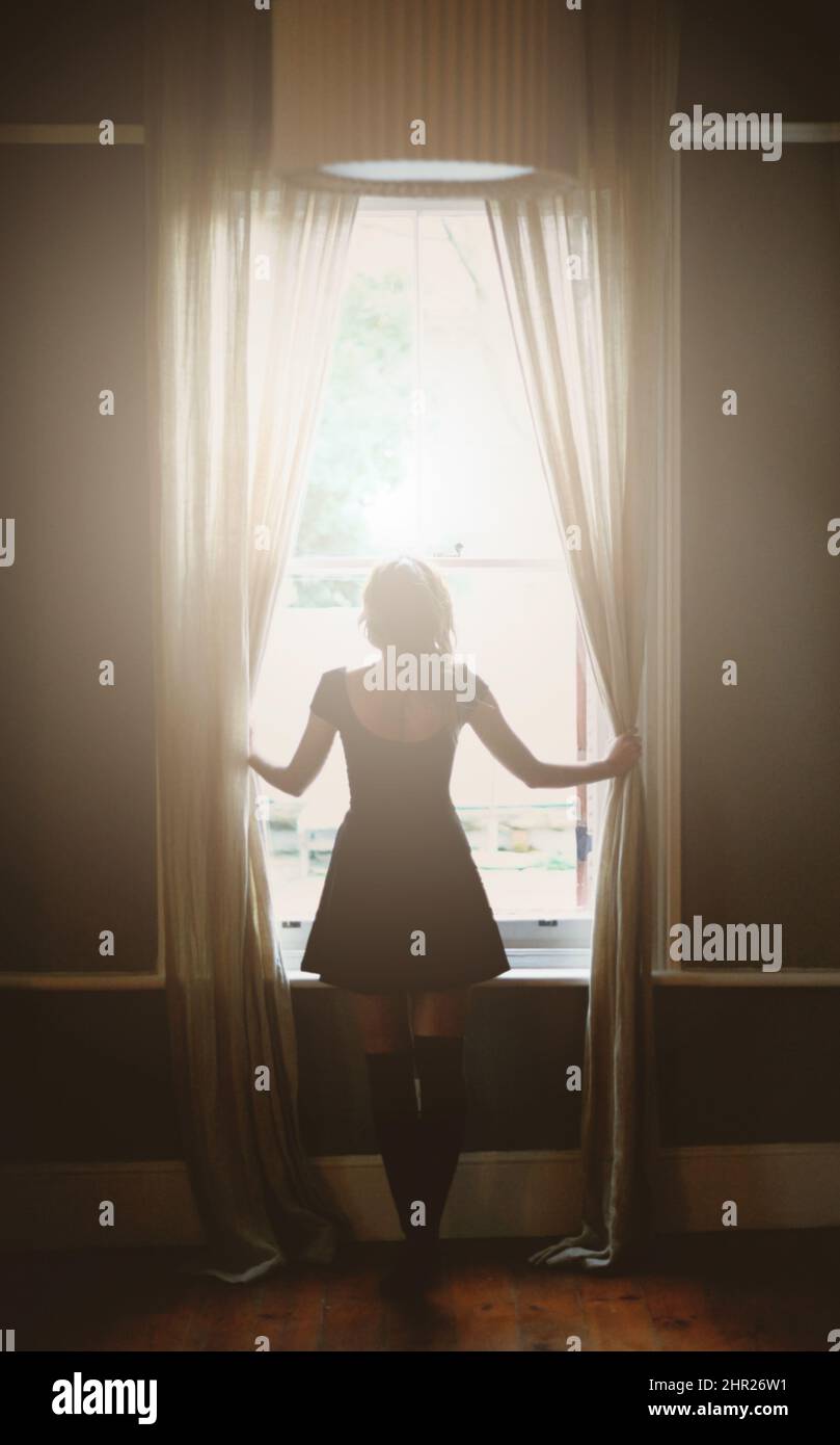 Its going to be a beautiful day.... Full length rear view of a young ...