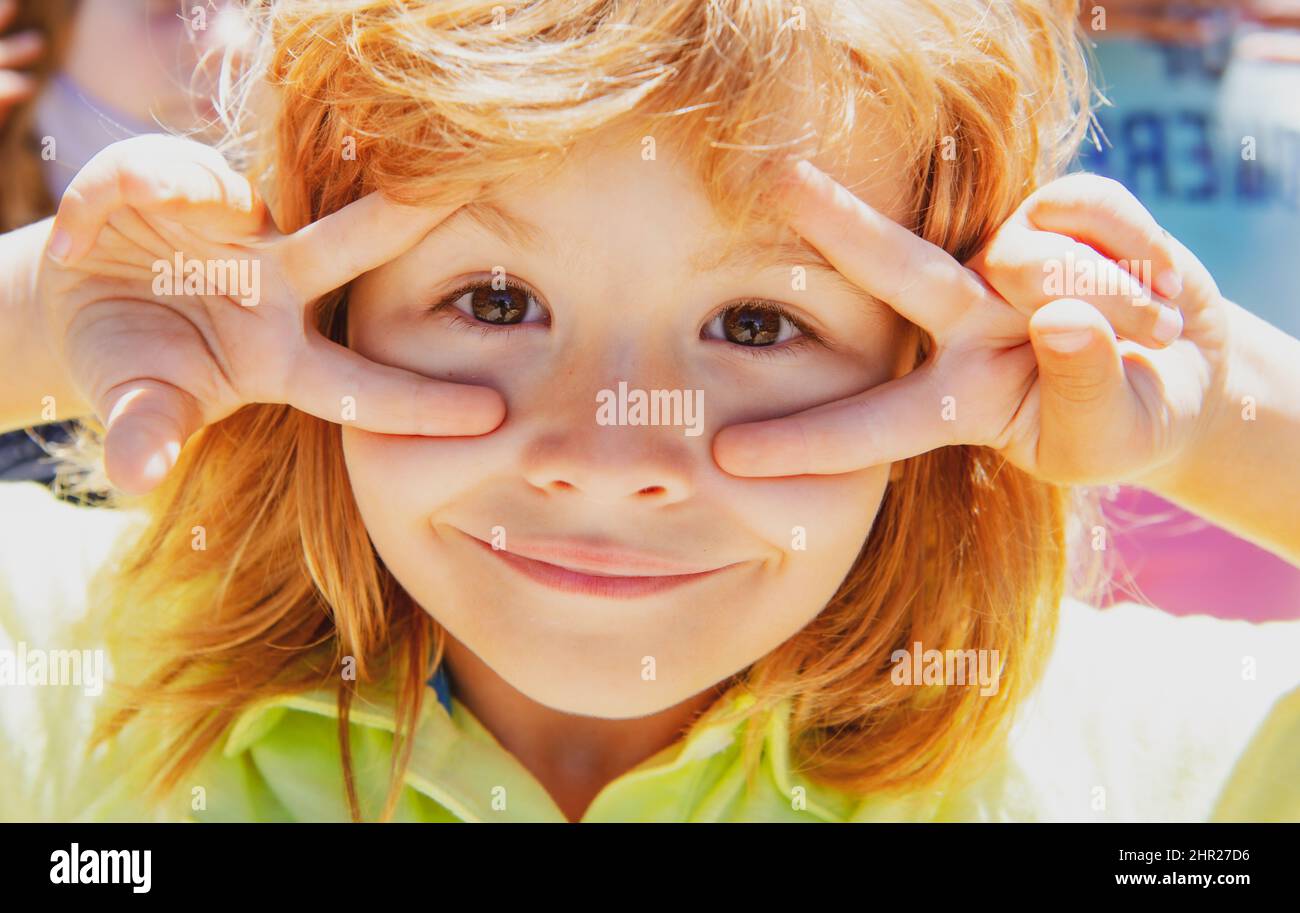 Kids funny face closeup. Childhood, leisure and children concept. Happy ...