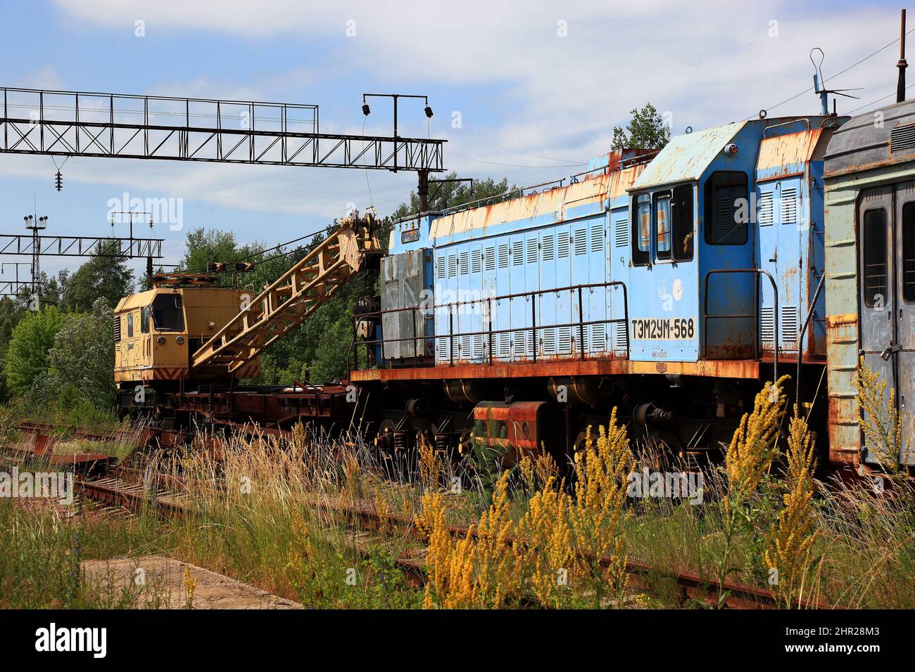 Ukraine, barrier zone, locomotive and loading crane on the grounds of ...