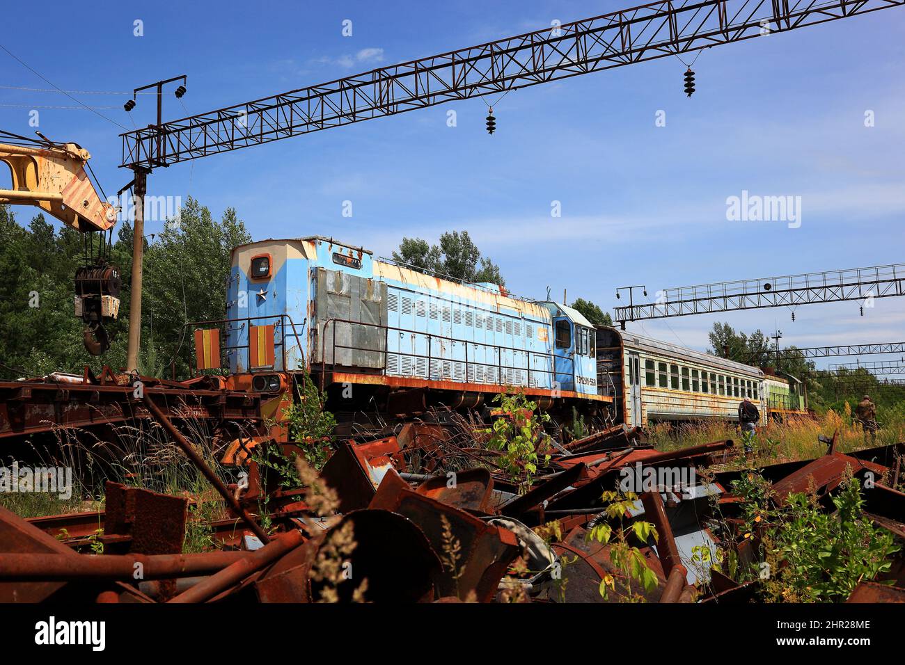 Ukraine, stop zone, locomotive, wagon and metal scrap on the grounds of ...