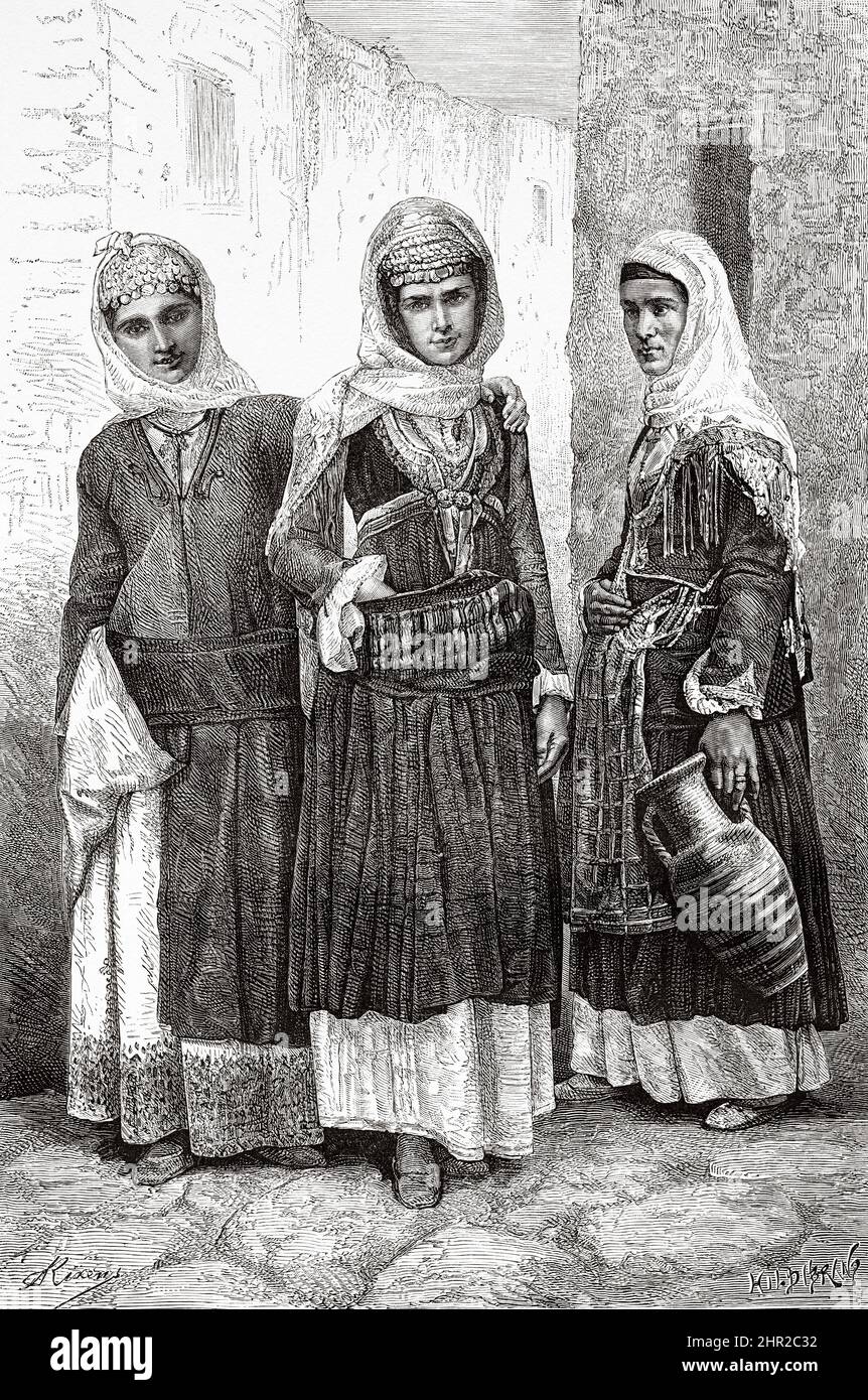 Women dressed in traditional Greek dress from the town of Megare ...
