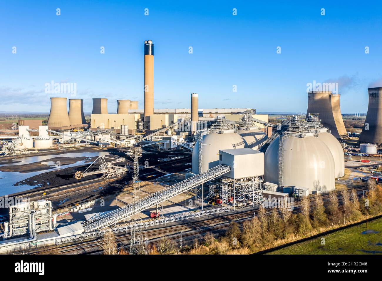 An aerial view of Drax Power Station in Yorkshire UK and the biomass storage tanks used to store ...